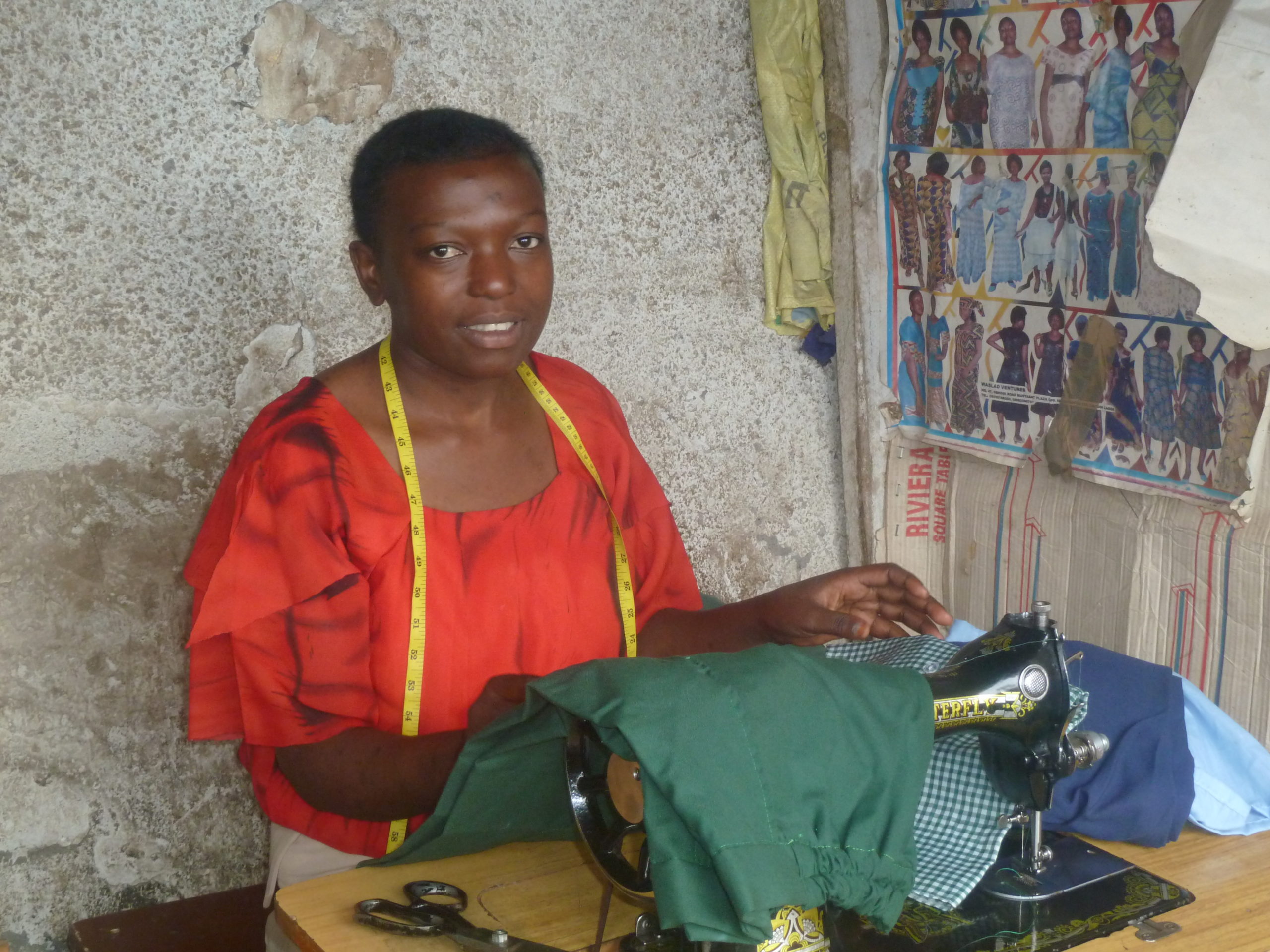 Amina making Uniforms as part of her tailoring business - Mondo - Mondo